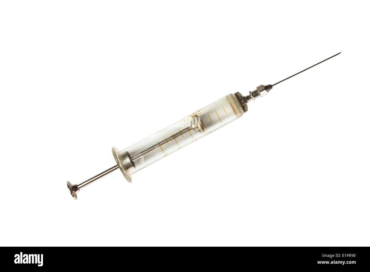 old medical syringe with a needle isolated on white Stock Photo - Alamy