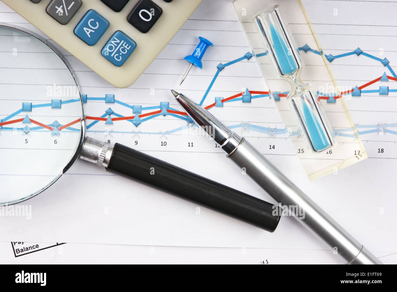 pen, magnifying glass and the working paper with a diagram Stock Photo ...
