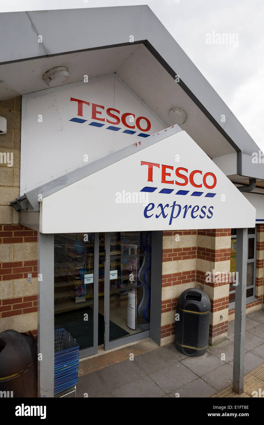 CHIPPENHAM, UK, 3rd June, 2014. A Tesco Express store entrance is ...