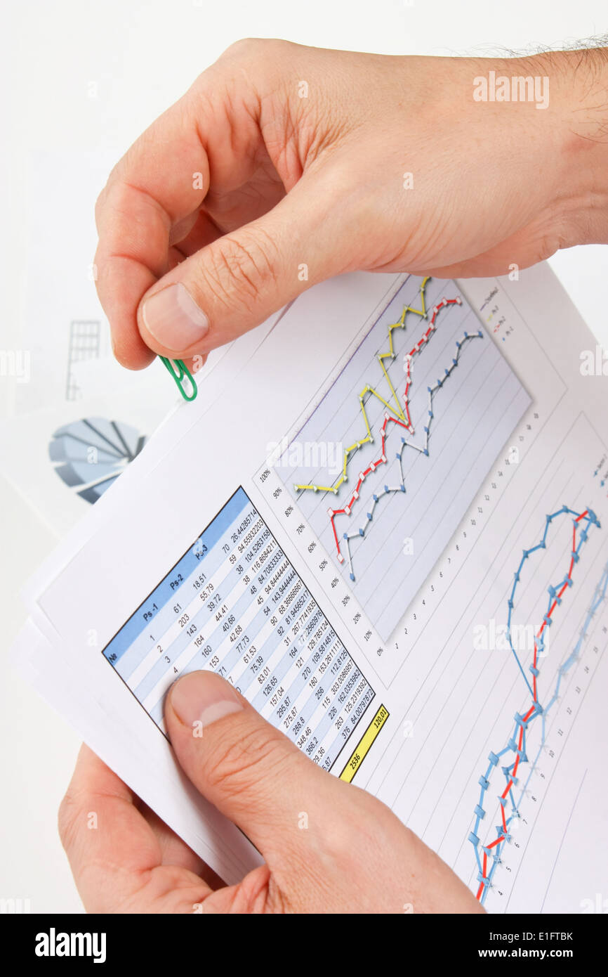 working paper with a diagram in hand Stock Photo - Alamy
