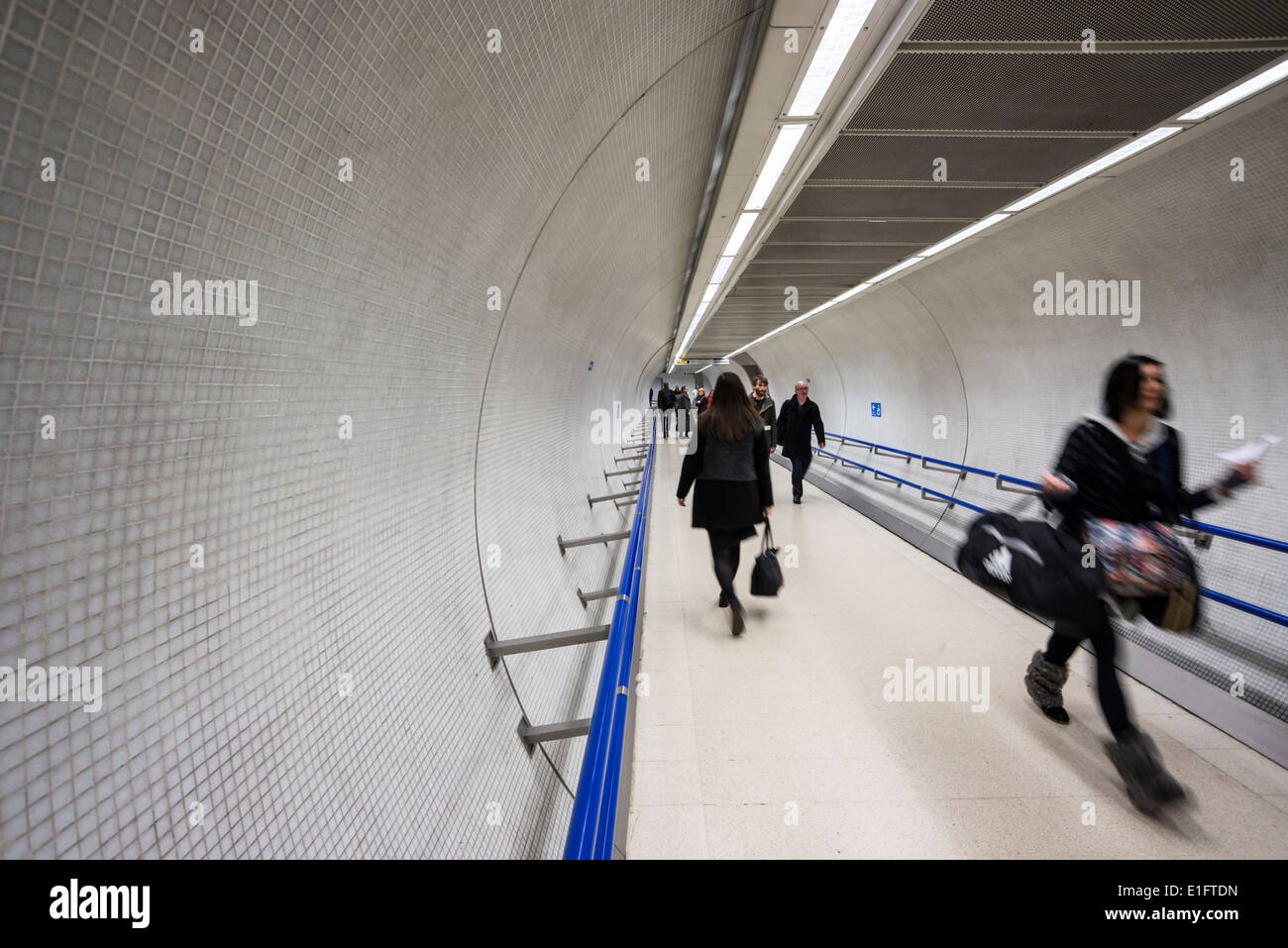 Passengers walking through passage in London Underground Station Stock ...