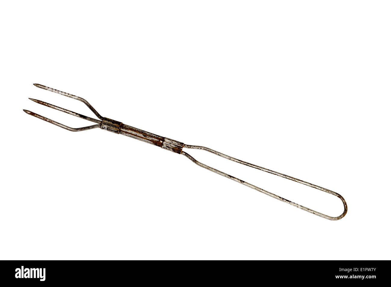 Antique wire meat fork on a solid white background Stock Photo - Alamy
