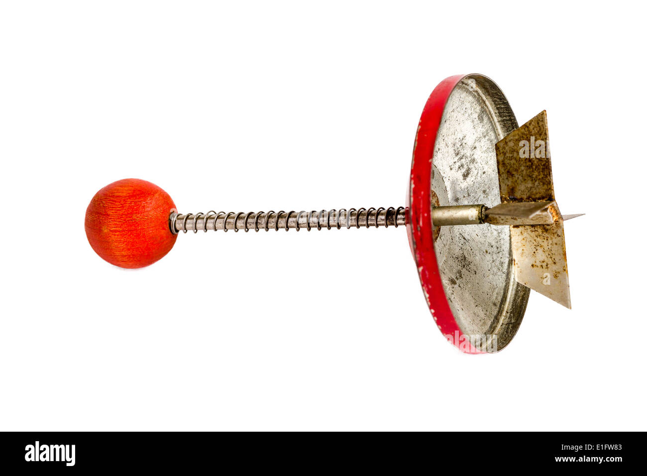 Antique nut chopper with a red handle on a solid white background Stock ...