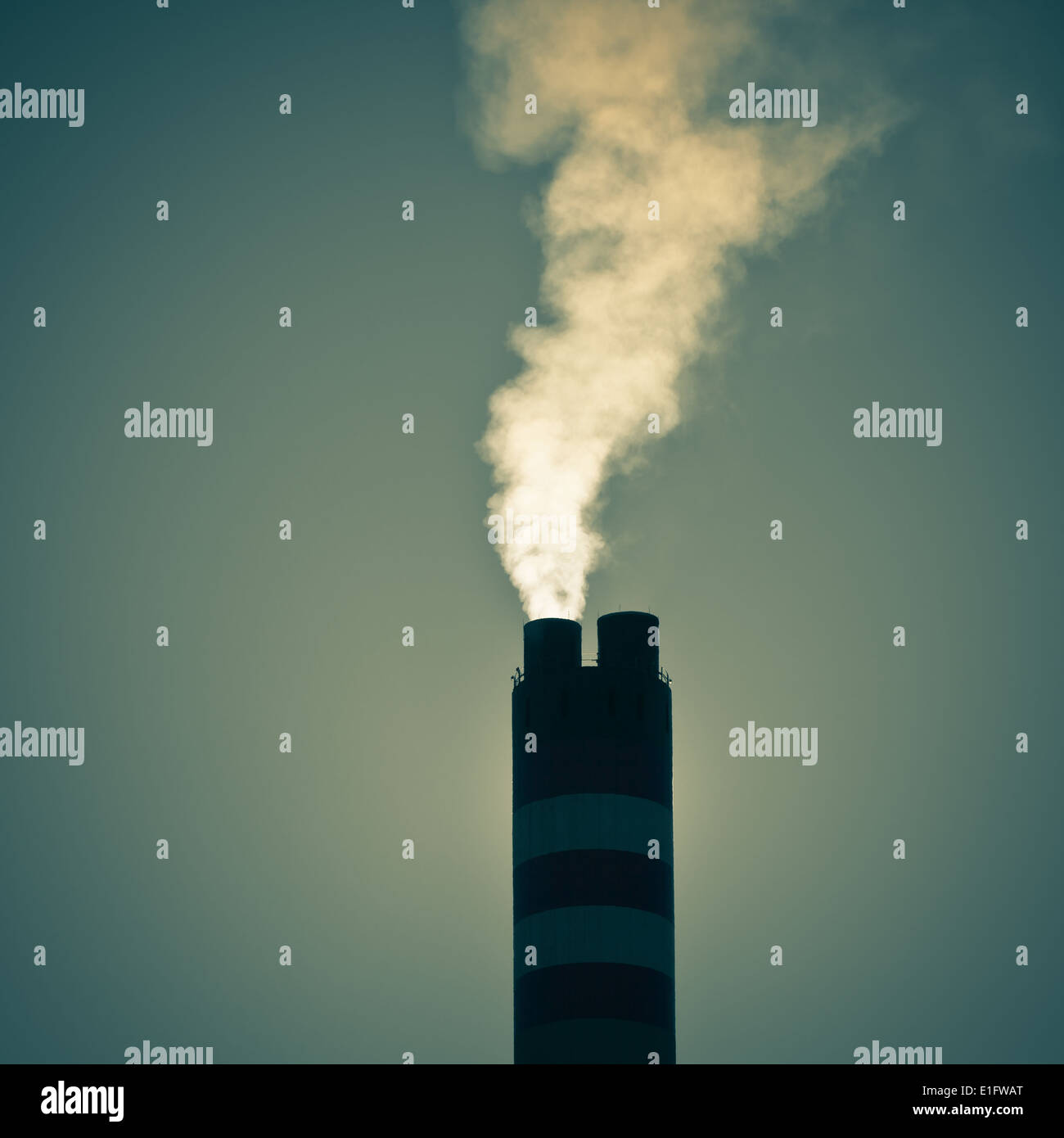 Industrial factory chimney with smoke against sky background. Instagram ...
