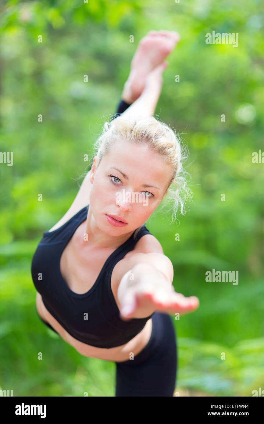 Lady practicing yoga in the nature Stock Photo - Alamy