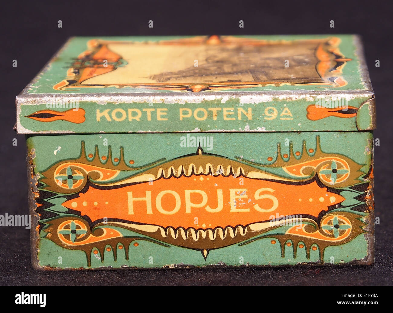 This image features a tin of Hopjes, a traditional Dutch candy, from ...