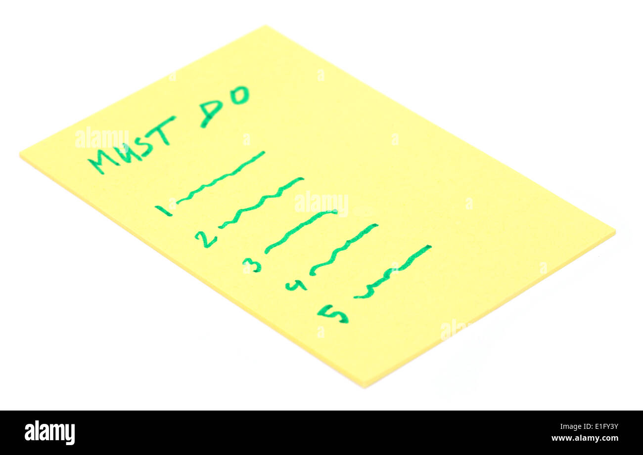Must Do list in yellow paper Stock Photo - Alamy