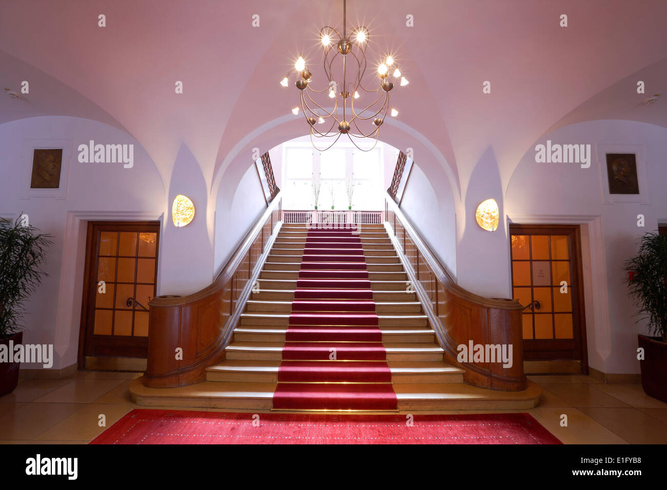 The interior of the foyer in Elmau castle near Kruen with the staircase ...