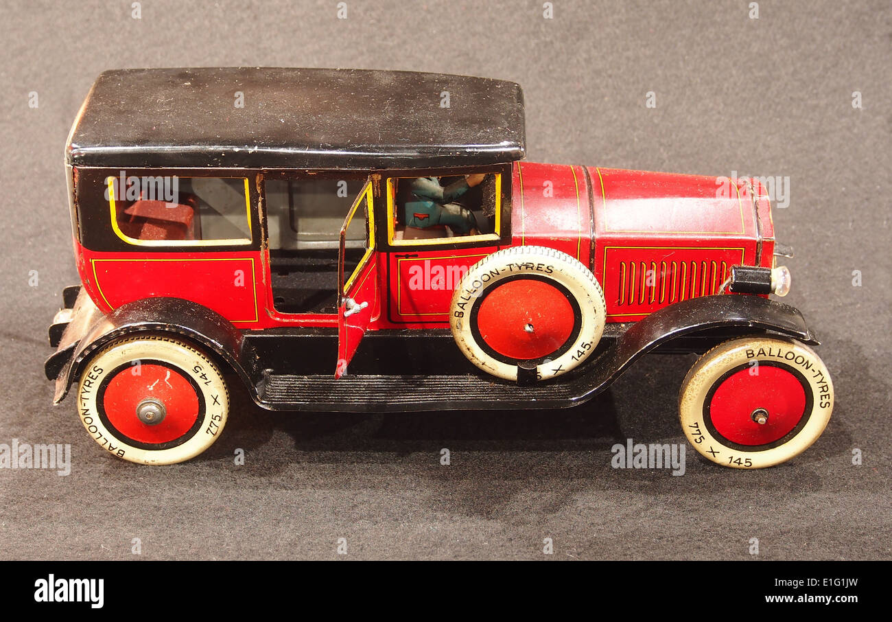 A vintage JDN tin car model 5681, made in Germany, depicting a classic ...