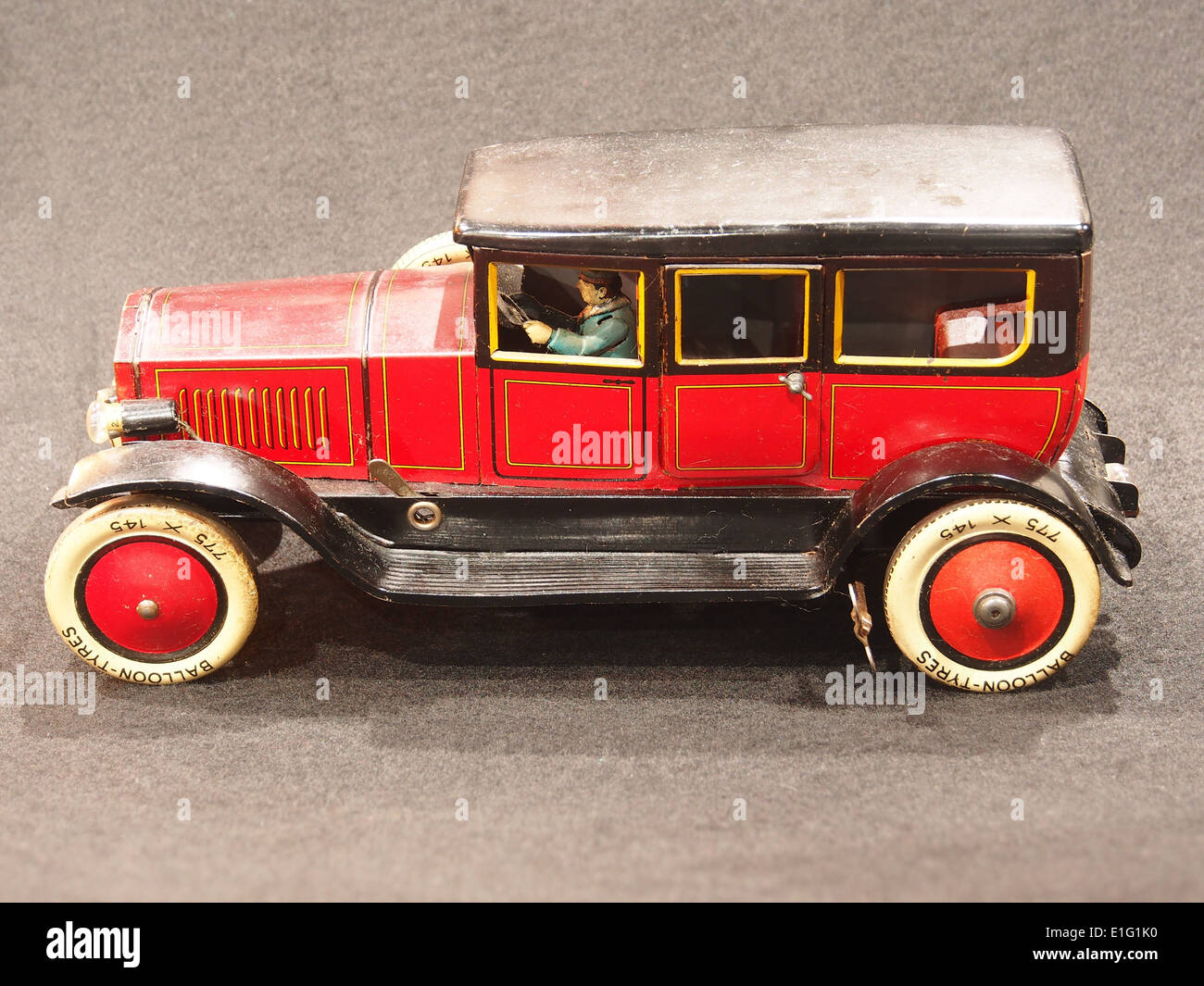 This photo features a JDN tin car model, number 5681, made in Germany ...