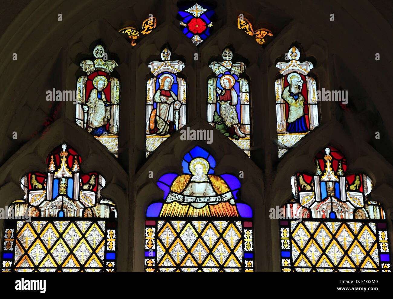 4 female saints and angel england uk english windows hi-res stock ...