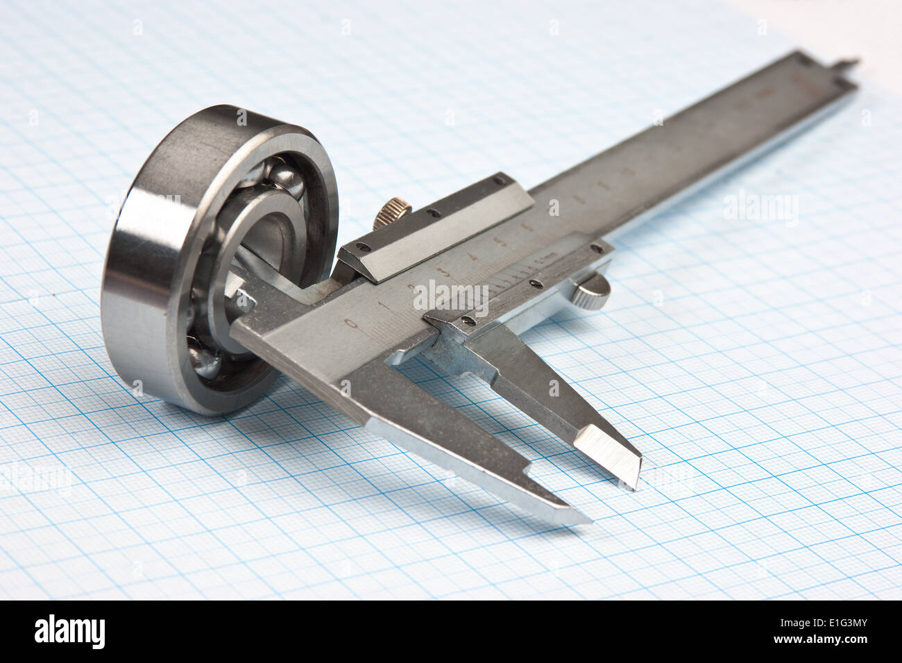 technical tools on a background of graph paper Stock Photo - Alamy