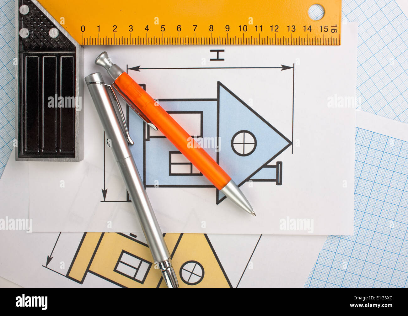 development drawings and tools on graph paper Stock Photo - Alamy