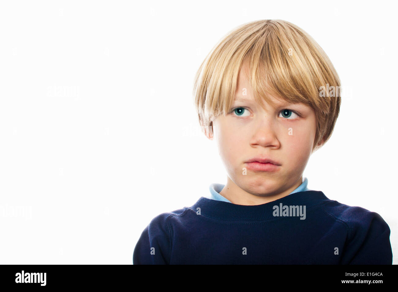 Grumpy school boy Stock Photo - Alamy