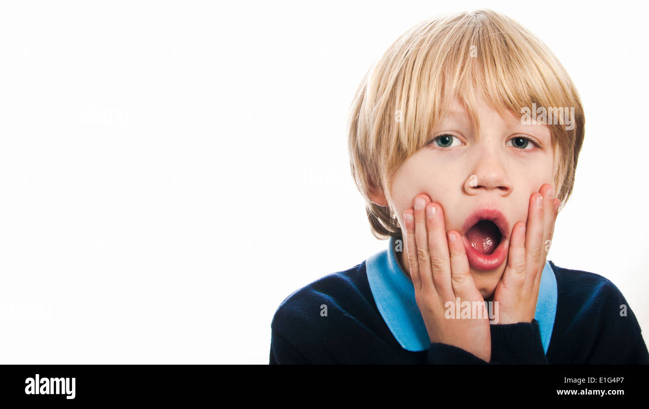 Boy with a shocked expression Stock Photo - Alamy