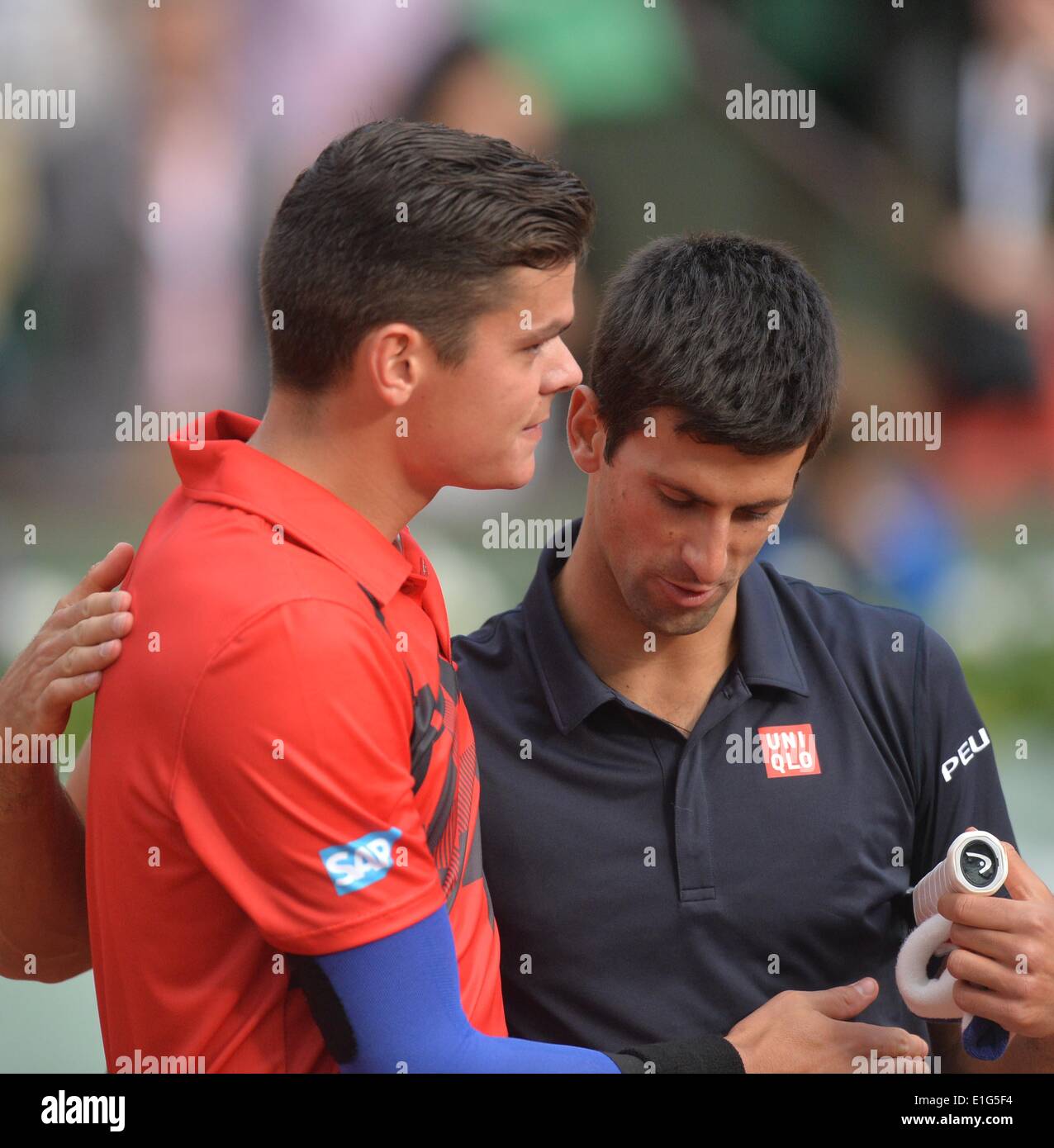 Paris, France. 3rd June, 2014. Serbia's Novak Djokovic (R) and Canada's ...