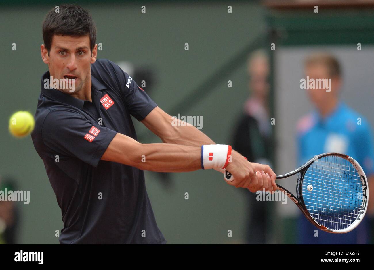 Paris, France. 3rd June, 2014. Serbia's Novak Djokovic returns a shot ...