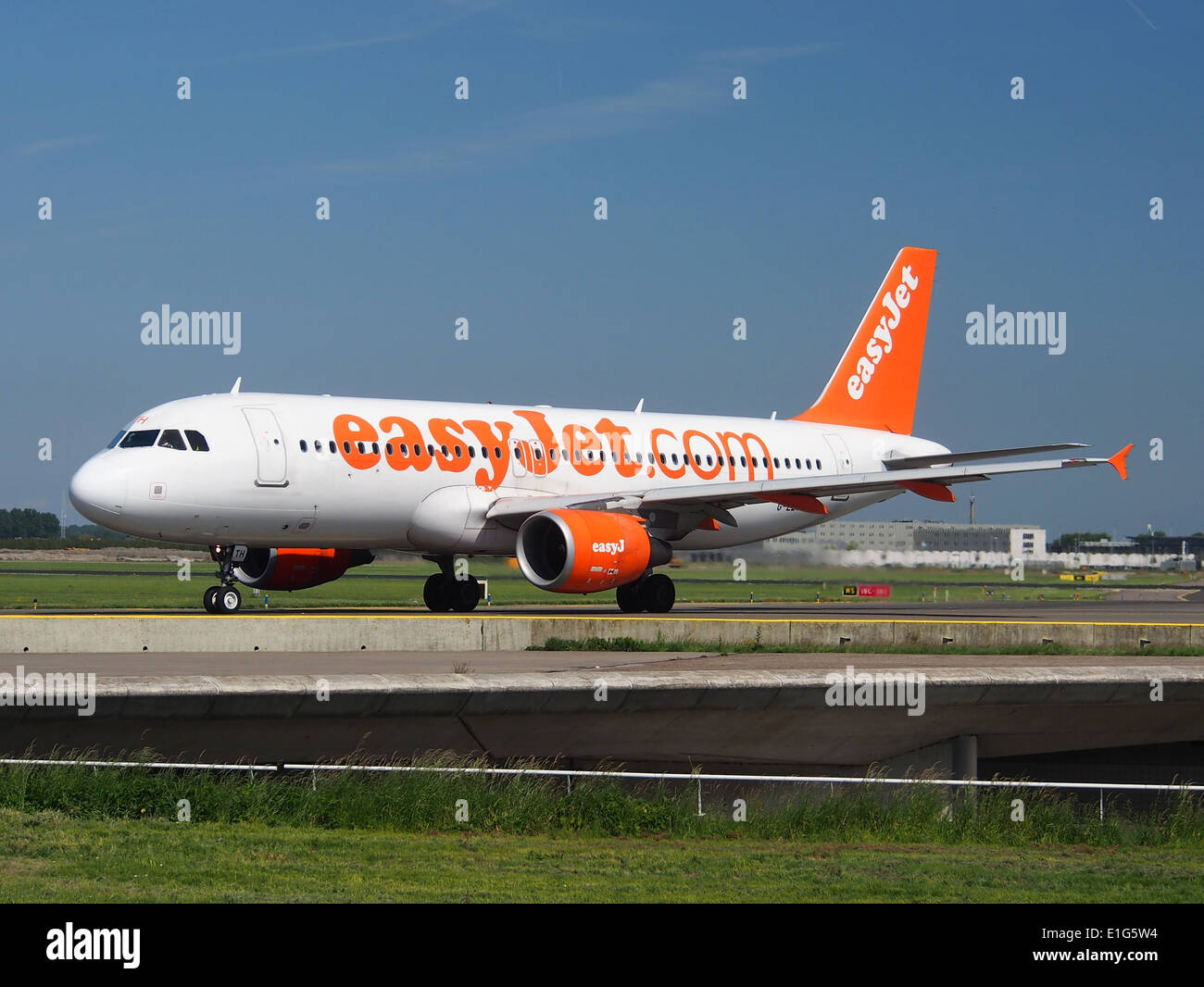 The easyJet Airbus A320-214, registration G-EZTH, taxis at Schiphol ...