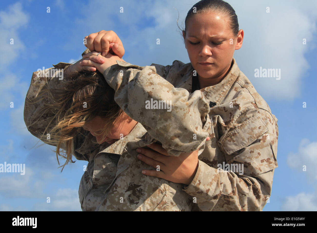 U.S. Marine Corps Cpl. Jessica Ward, right, a female engagement team ...