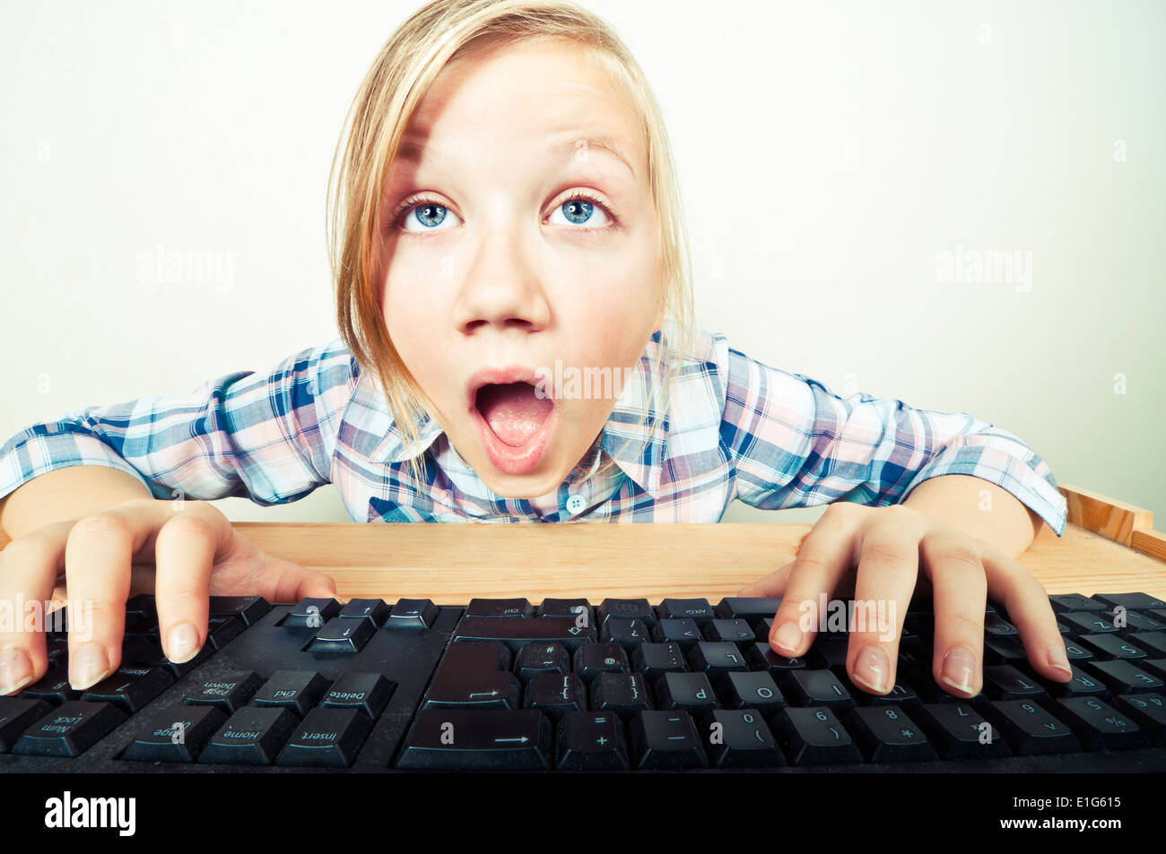 Surprised girl at work Stock Photo - Alamy