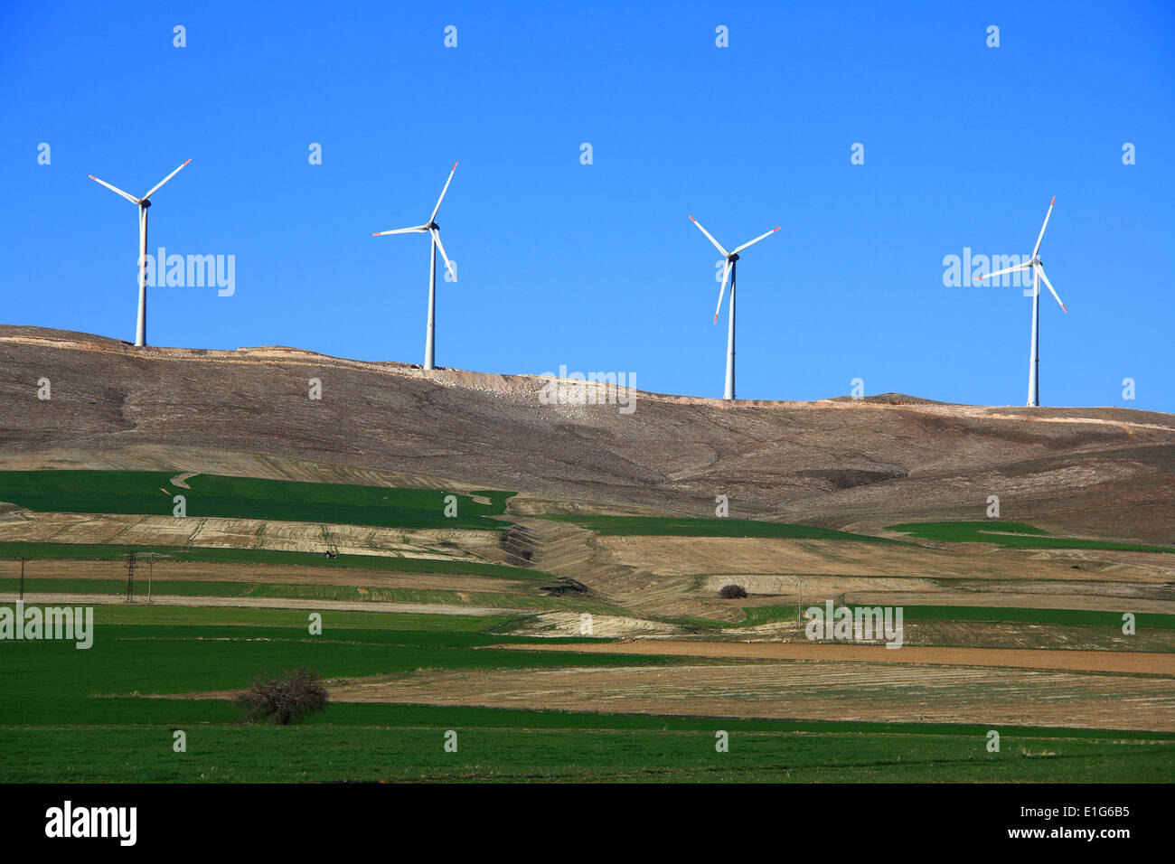 windmill generating alternative energy Stock Photo - Alamy