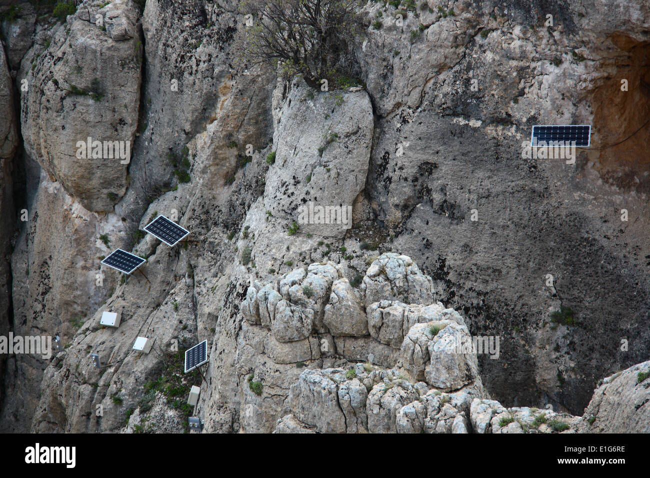 solar energy panels on rocks generating energy Stock Photo - Alamy
