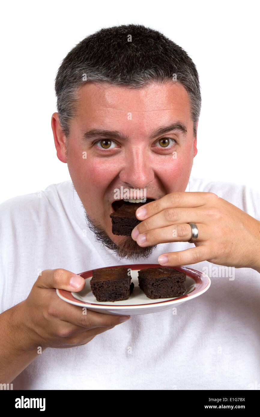 Man Eating Chocolate Stock Photos & Man Eating Chocolate Stock Images ...