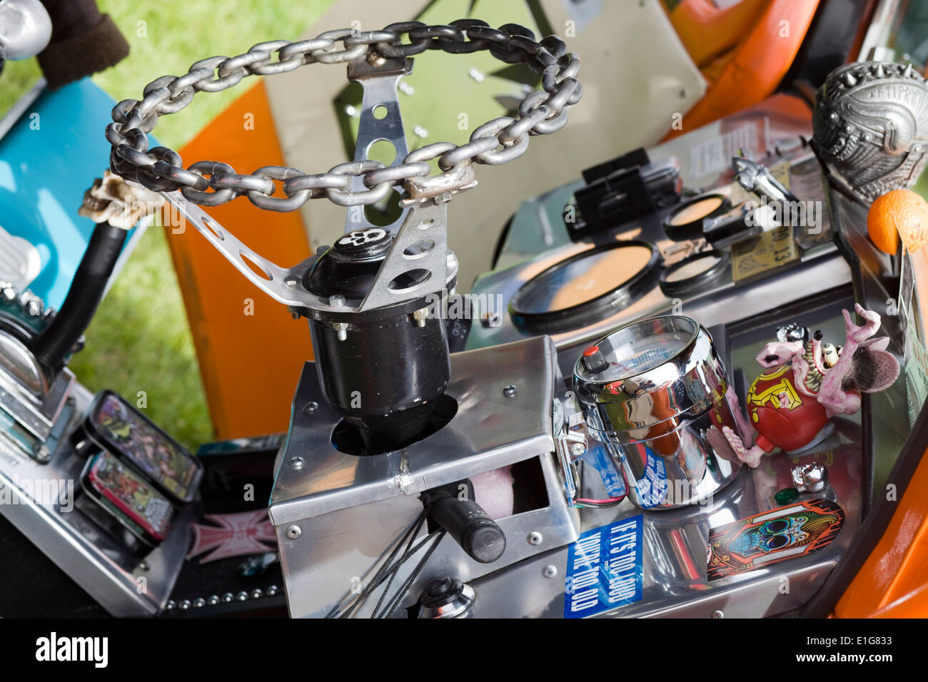 Chain link steering wheel of a low rider car on display Stock Photo - Alamy