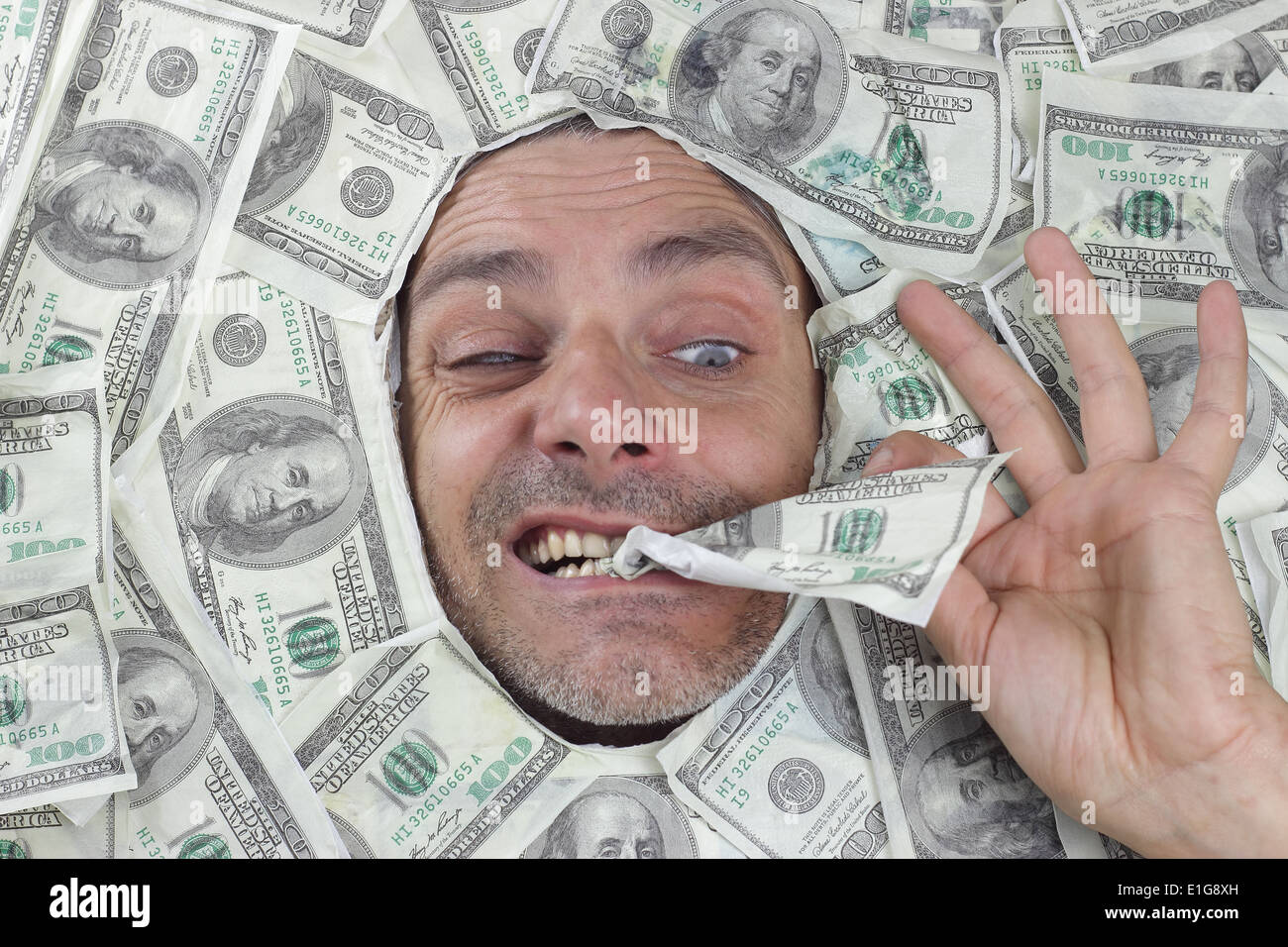 man eating dollar notes. financial concept Stock Photo - Alamy