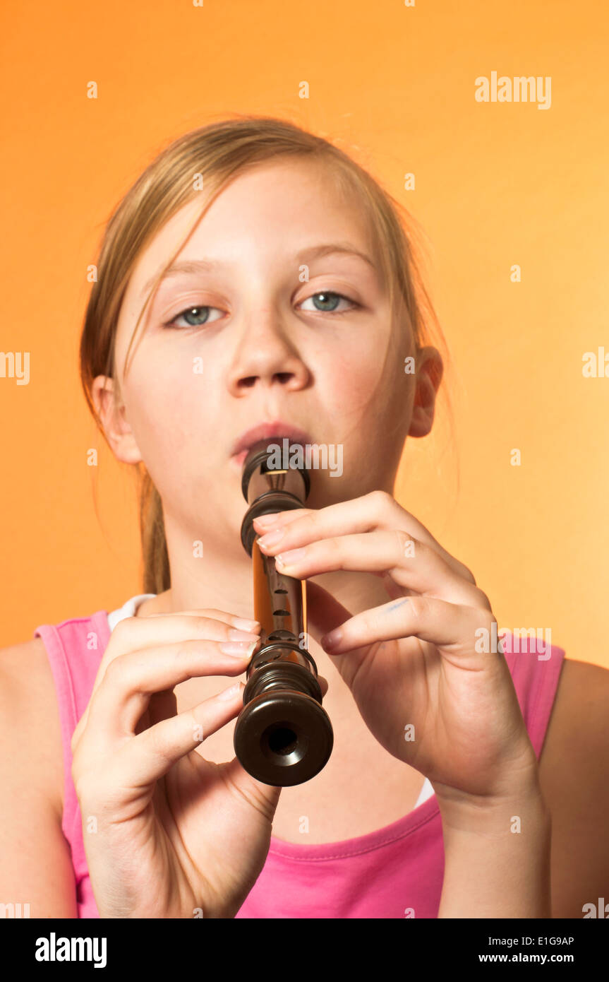 Child learning to play an instrument Stock Photo - Alamy