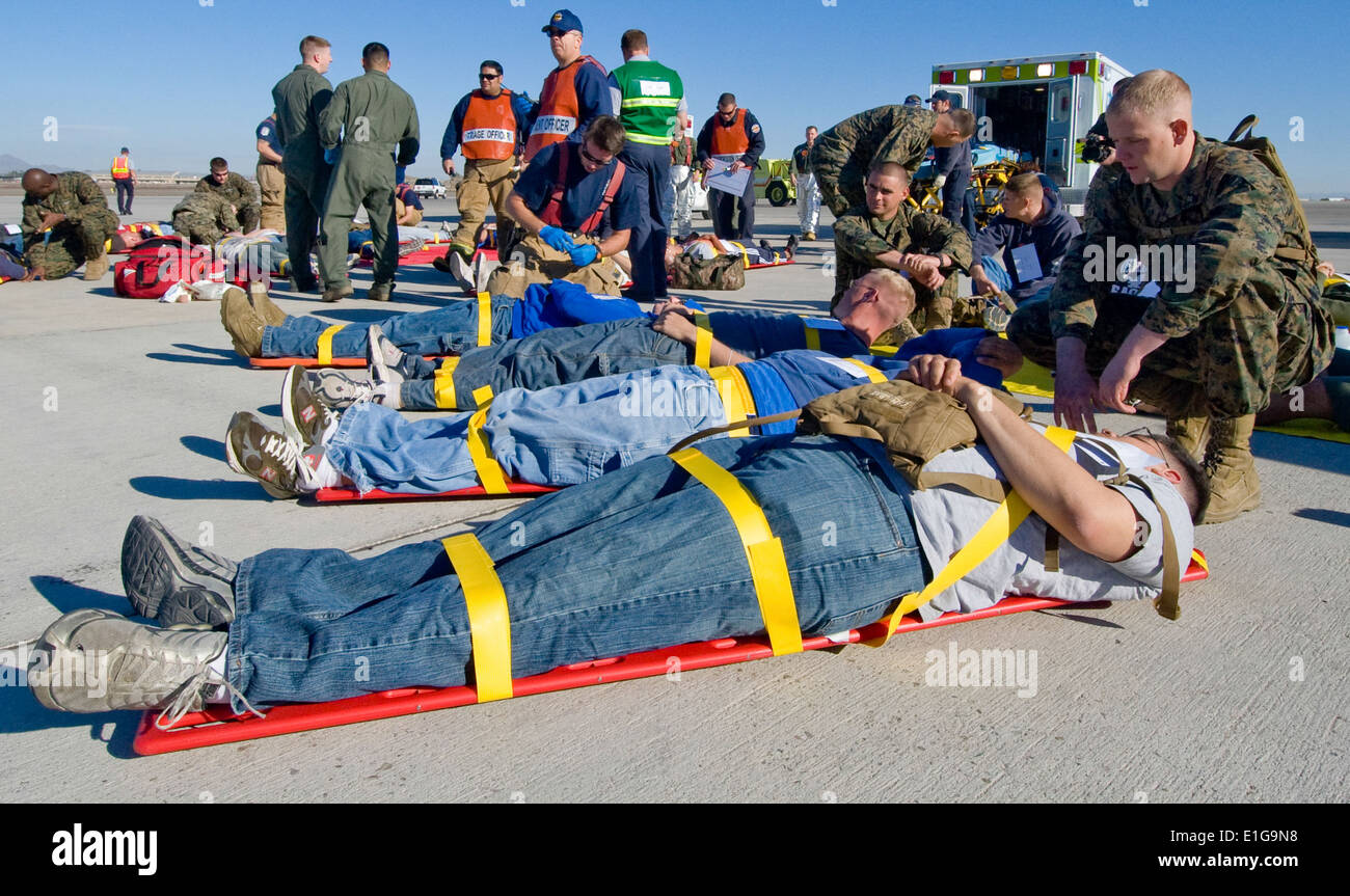 U.S. Marines and civilians from the Yuma Fire Department, the Yuma ...