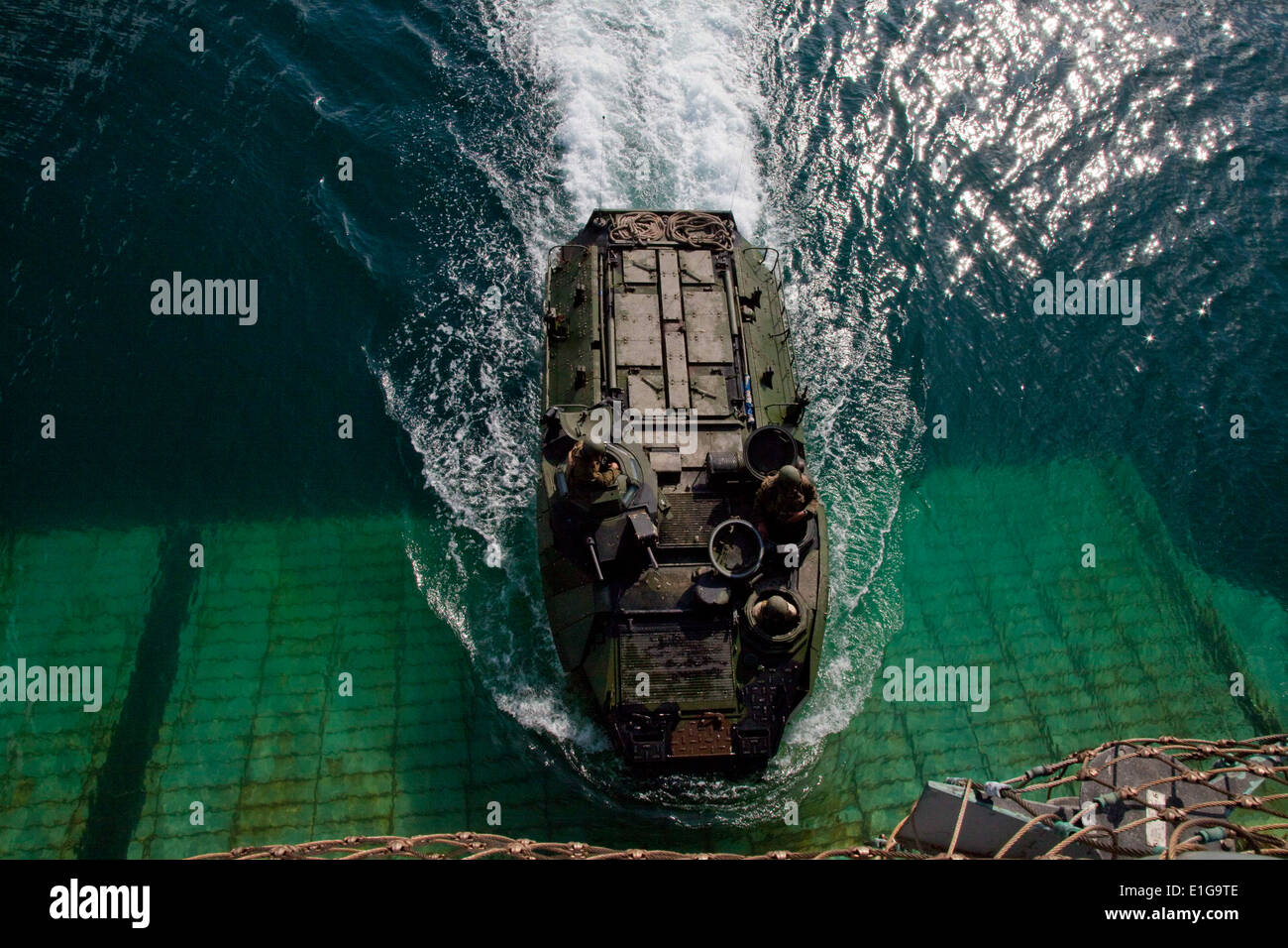 U.S. Marines attached to a security cooperation task force return an ...