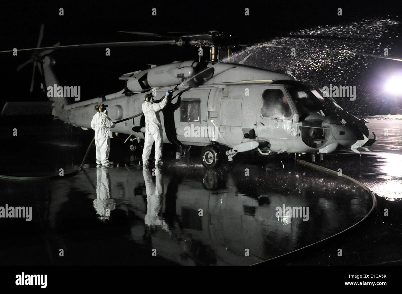 U.S. Sailors assigned to Helicopter Anti-submarine Squadron (HS) 14 and ...