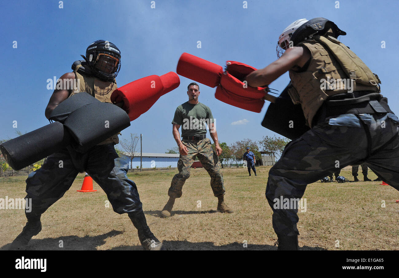 U.S. Marine Corps Sgt. Michael Roth, center, assigned to Marine Corps ...