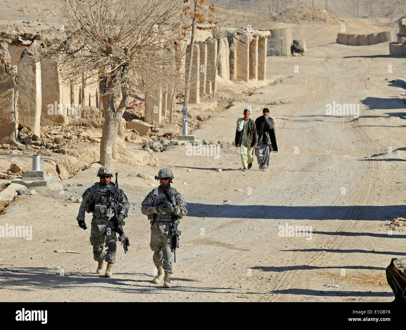 U.S. Army Sgt. Johnny Hoyos, left, and Air Force Senior Airman Aaron ...