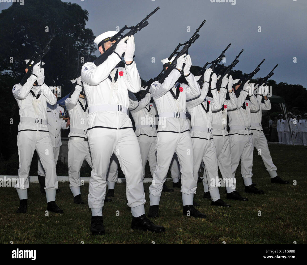 Sailors with the Royal New Zealand Navy render a gun salute during an ...
