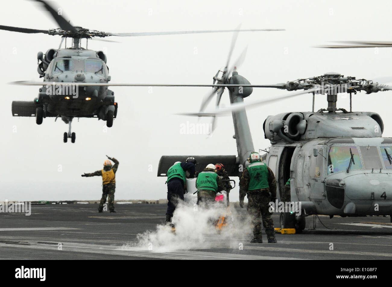 A U.S. Navy SH-60B Sea Hawk helicopter, assigned to Helicopter Anti ...