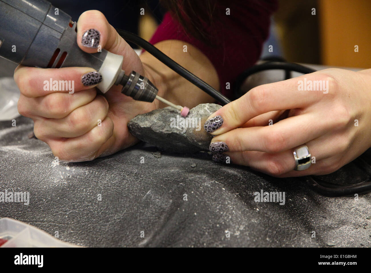 Fossil preparation with beautifully painted fingenails Stock Photo - Alamy