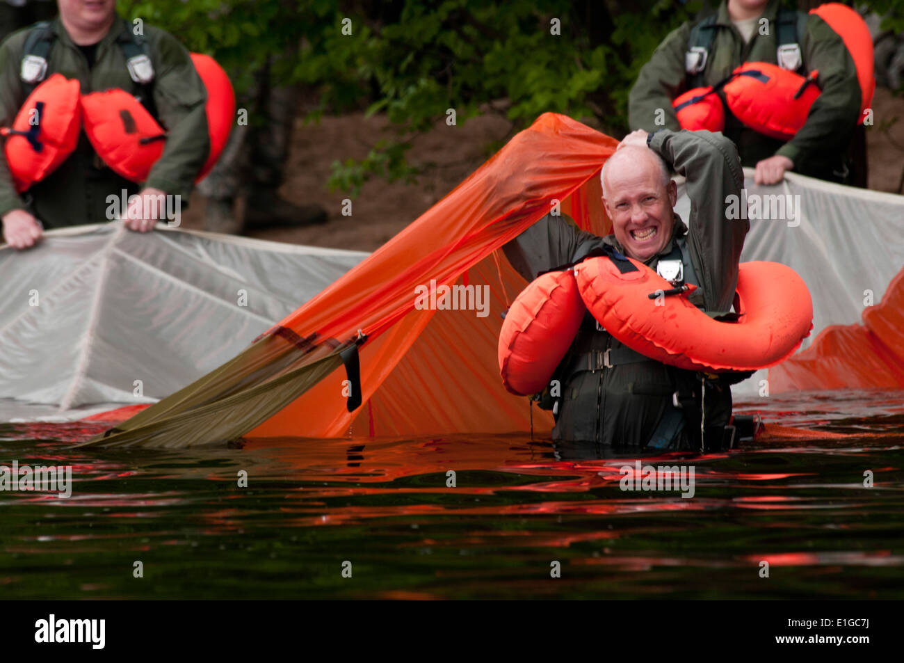 U.S. Air Force Lt. Col. Daniel E. Gabrielli comes up after swimming ...