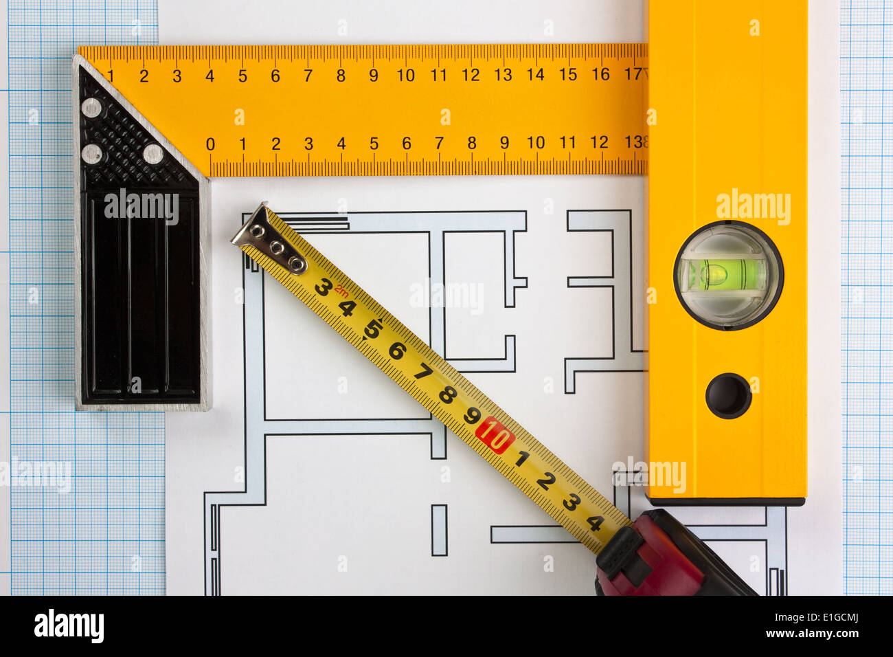 development drawings and tools on graph paper Stock Photo - Alamy