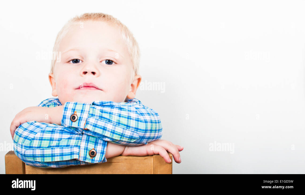Cute child thinking Stock Photo - Alamy