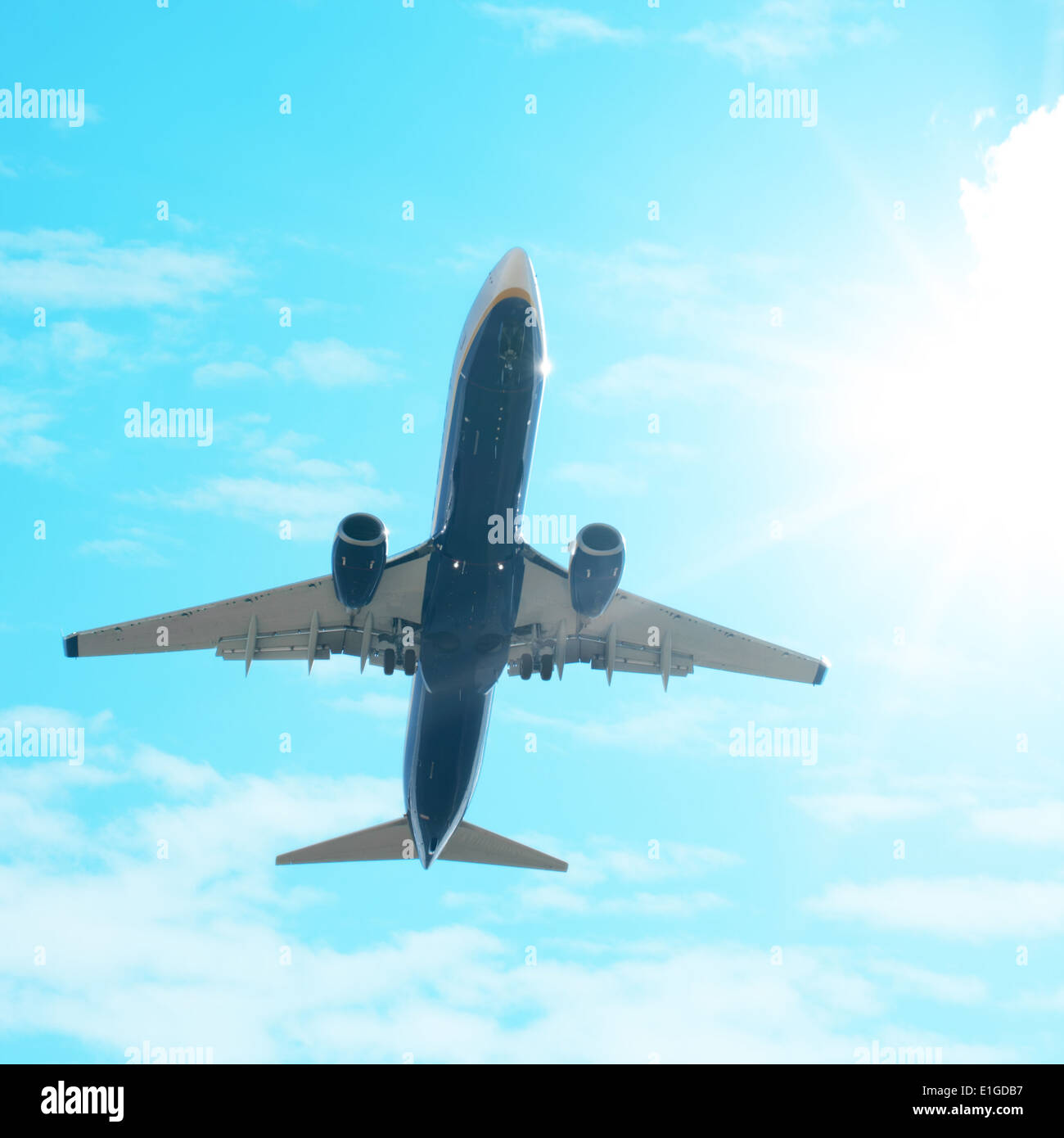 Airplane flying in the air Stock Photo - Alamy