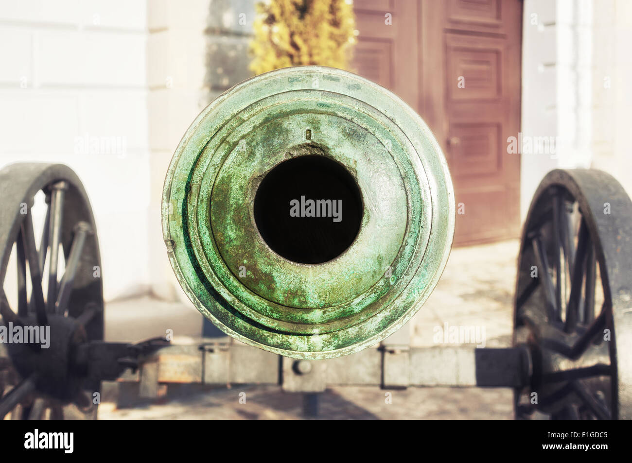 Old cannon in front of a building Stock Photo - Alamy