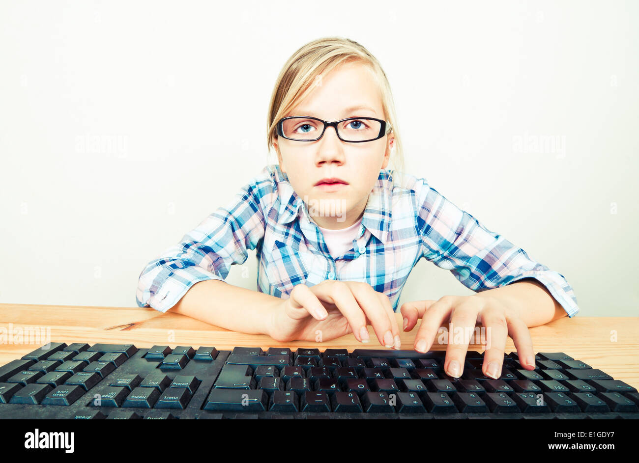 Girl using computer Stock Photo - Alamy