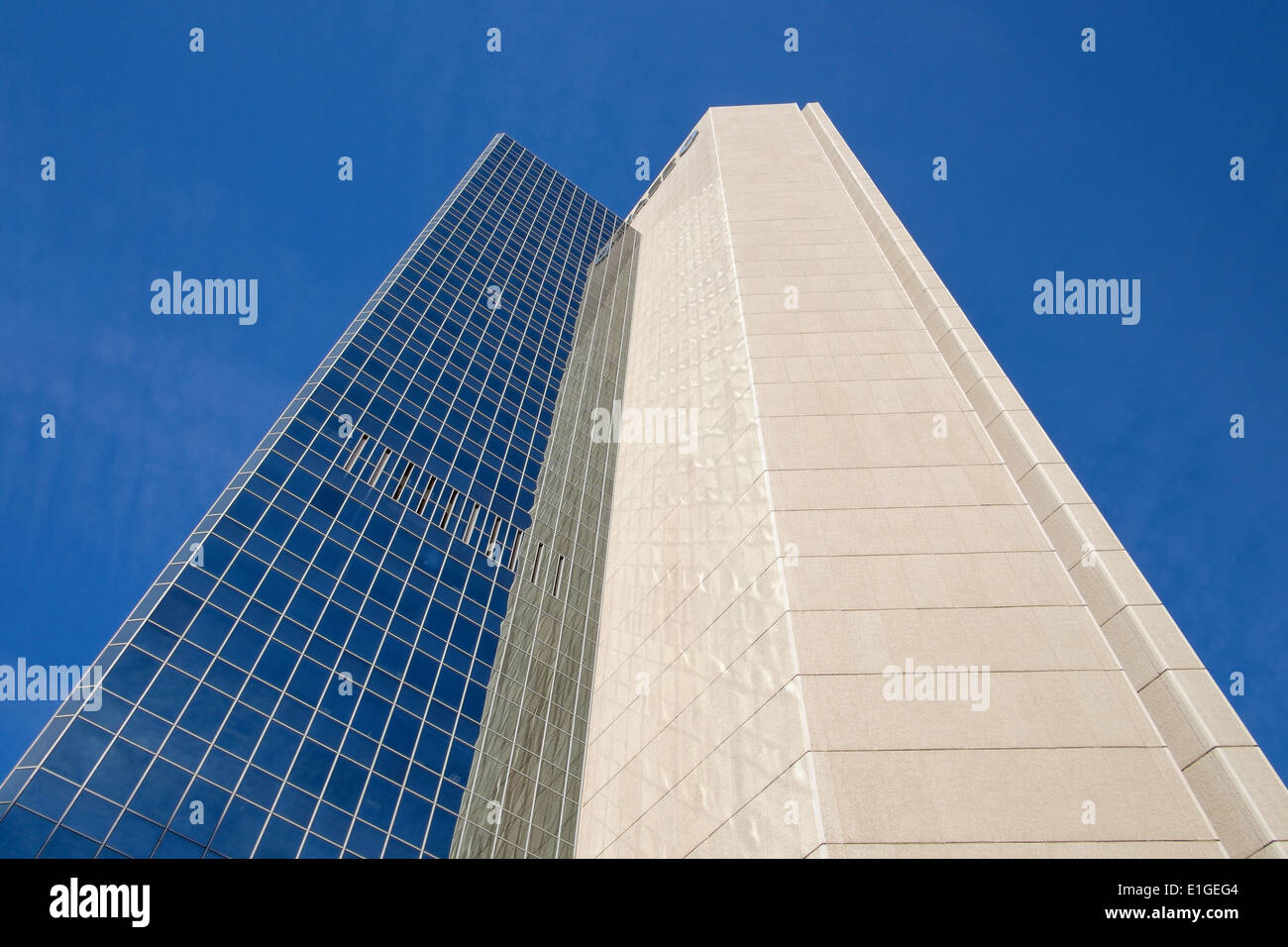 Modern glass and concrete skyscrapers against a blue sky, in Phoenix ...