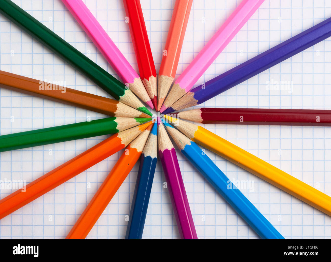 colored pencils at school notebook Stock Photo - Alamy