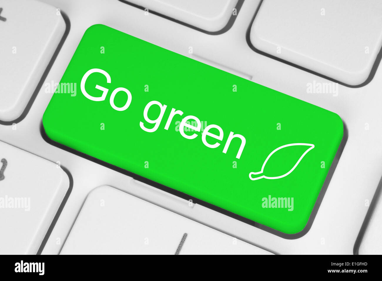 Go green button on keyboard background Stock Photo - Alamy