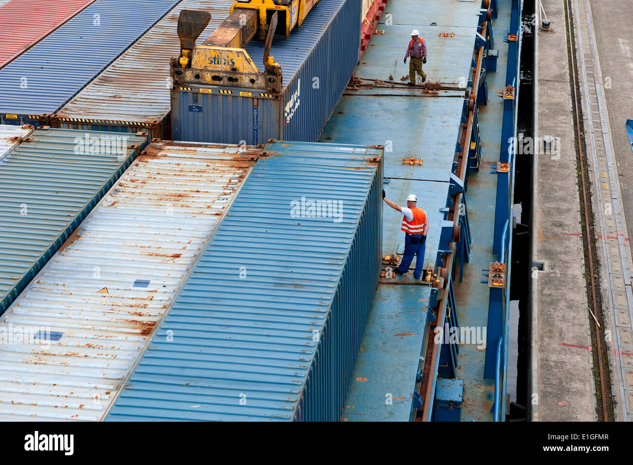 Loading containers on the feedership MS Emma in the harbour Moerdijk ...