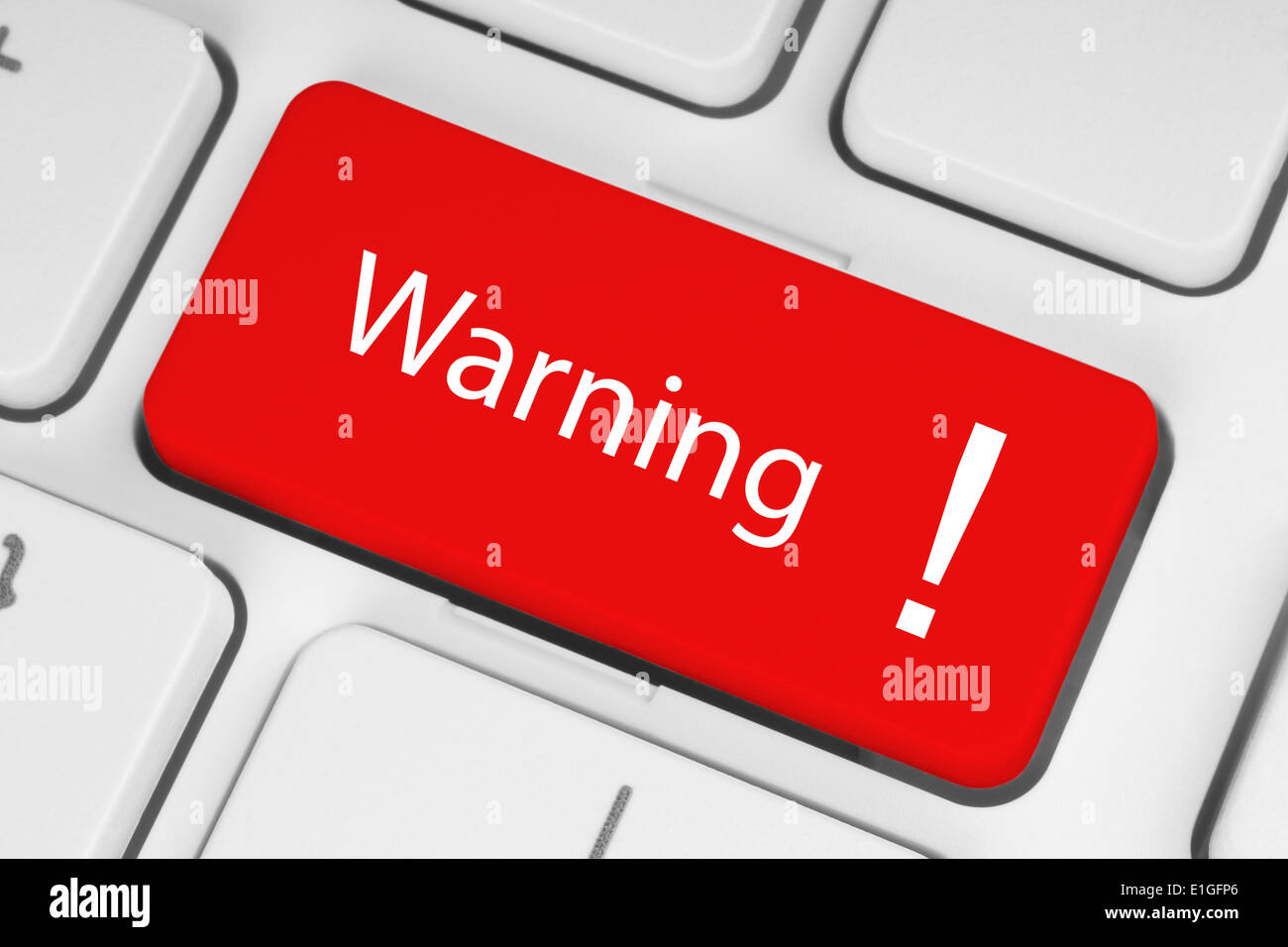 Red warning button on the keyboard Stock Photo - Alamy