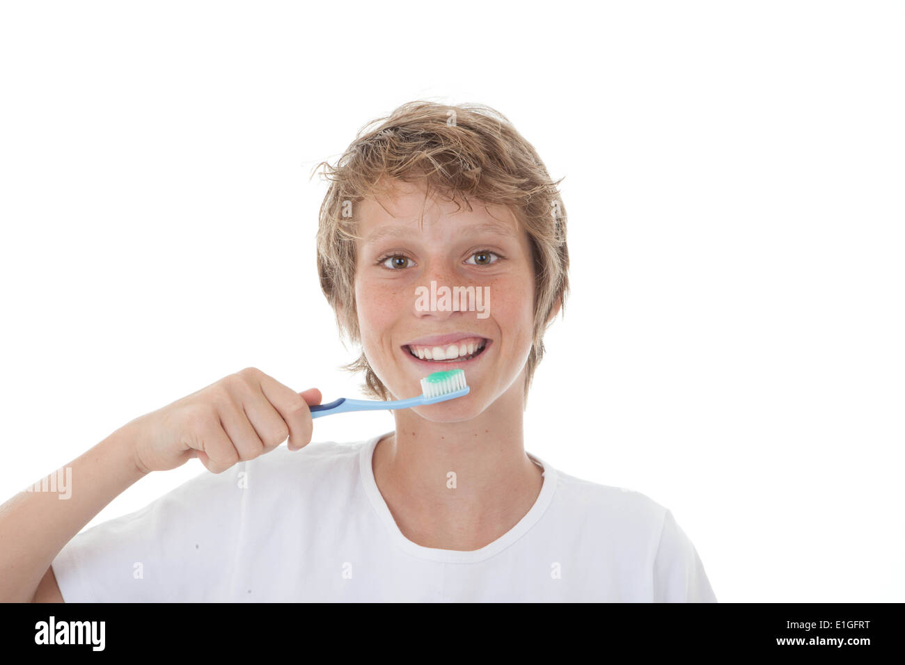 Teen boy brushing teeth hi-res stock photography and images - Alamy